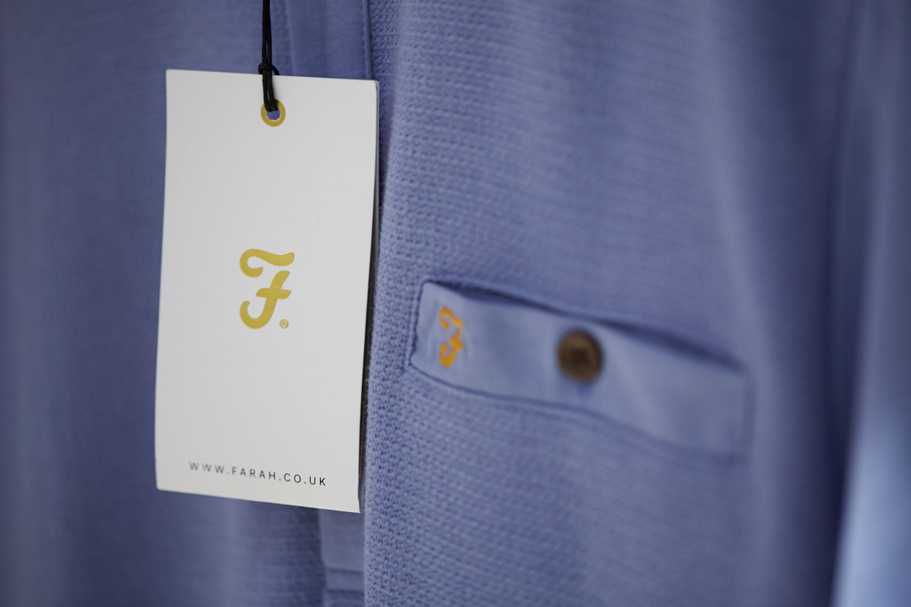 Farah menswear brand rolls out new minimal logo - Design Week