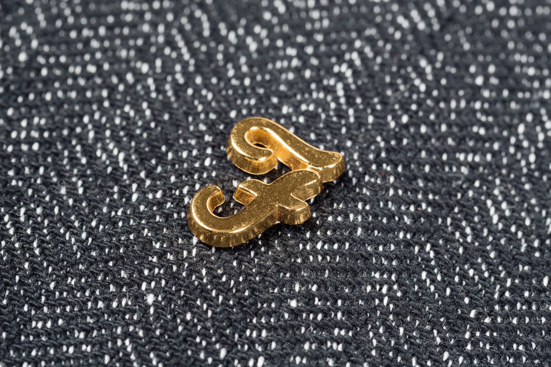 Farah menswear brand rolls out new minimal logo - Design Week
