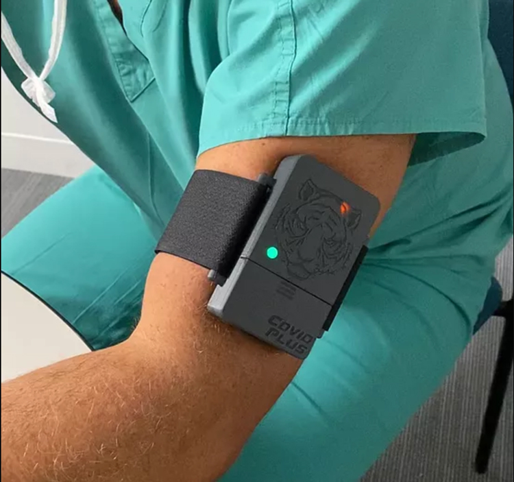 This non-invasive armband uses machine-learning to screen for Covid ...